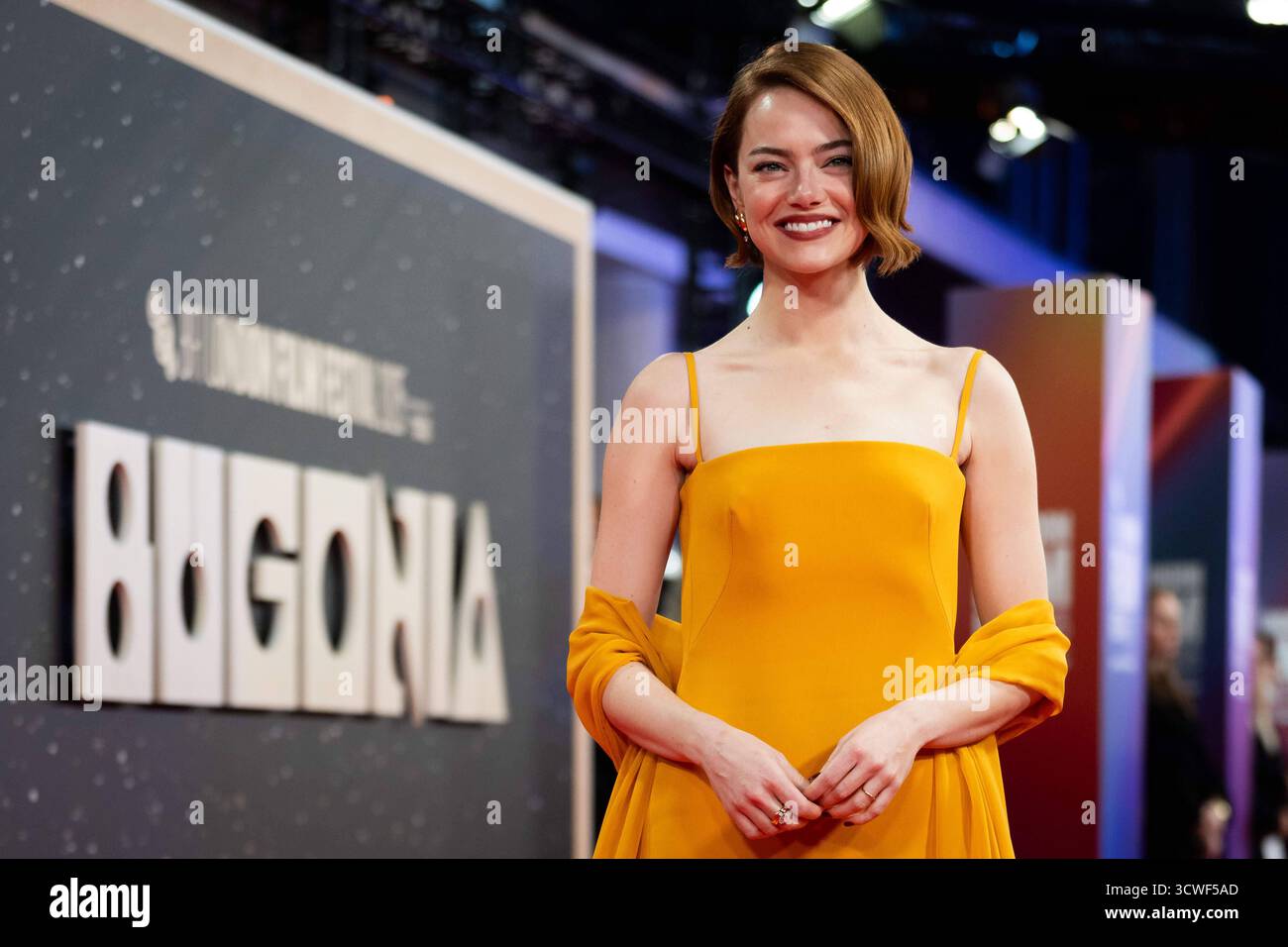 Emma Stone poses for photographers upon arrival at the premiere of the ...