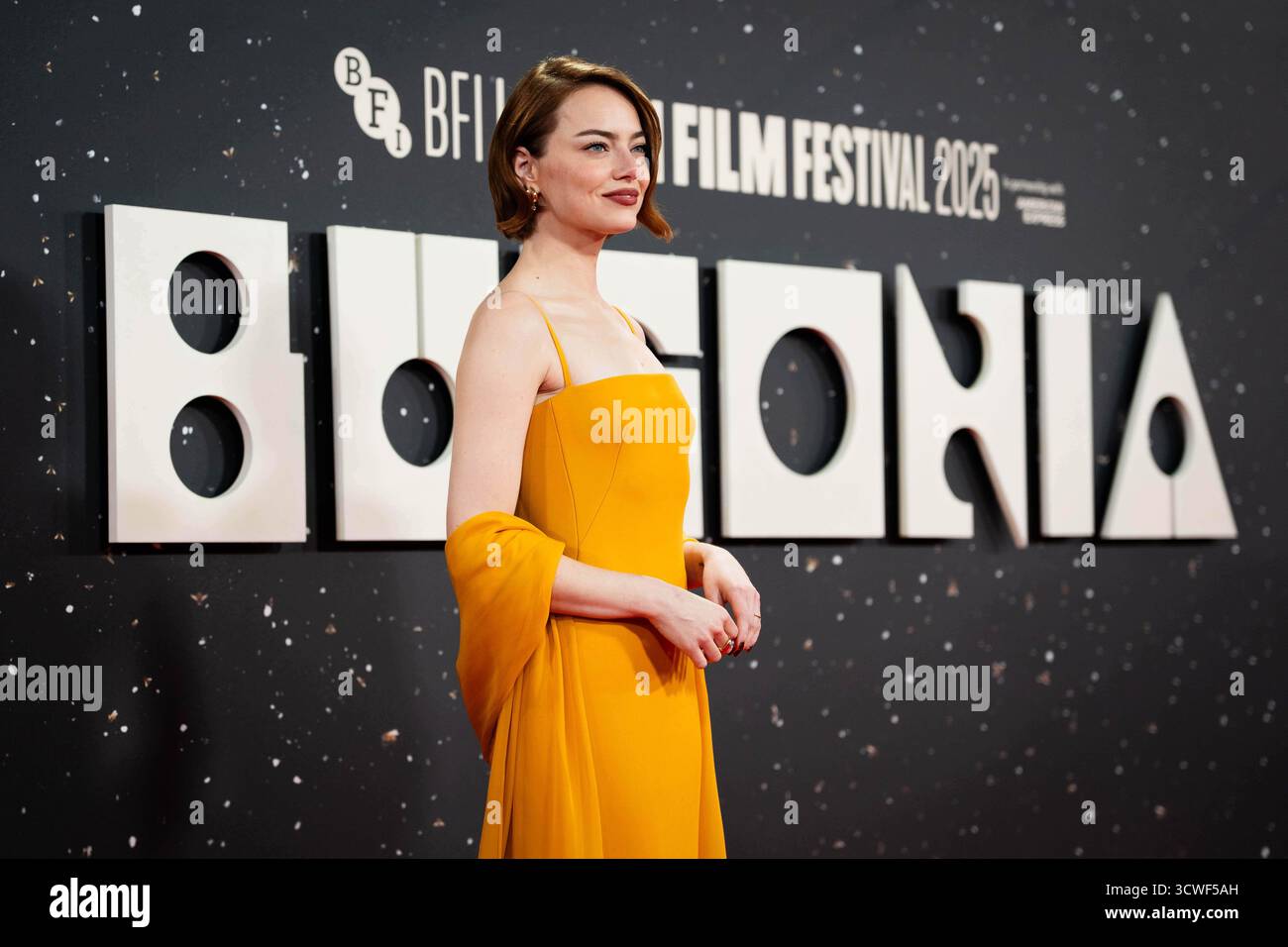 Emma Stone poses for photographers upon arrival at the premiere of the ...