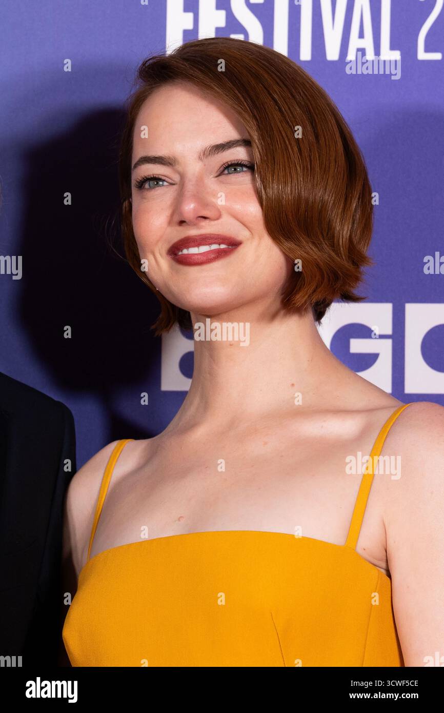 Emma Stone poses for photographers upon arrival at the premiere of the ...