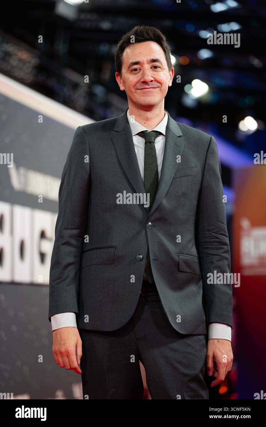 Will Tracy poses for photographers upon arrival at the premiere of the ...