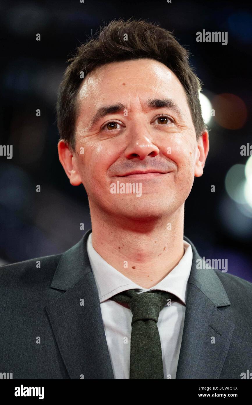 Will Tracy poses for photographers upon arrival at the premiere of the ...