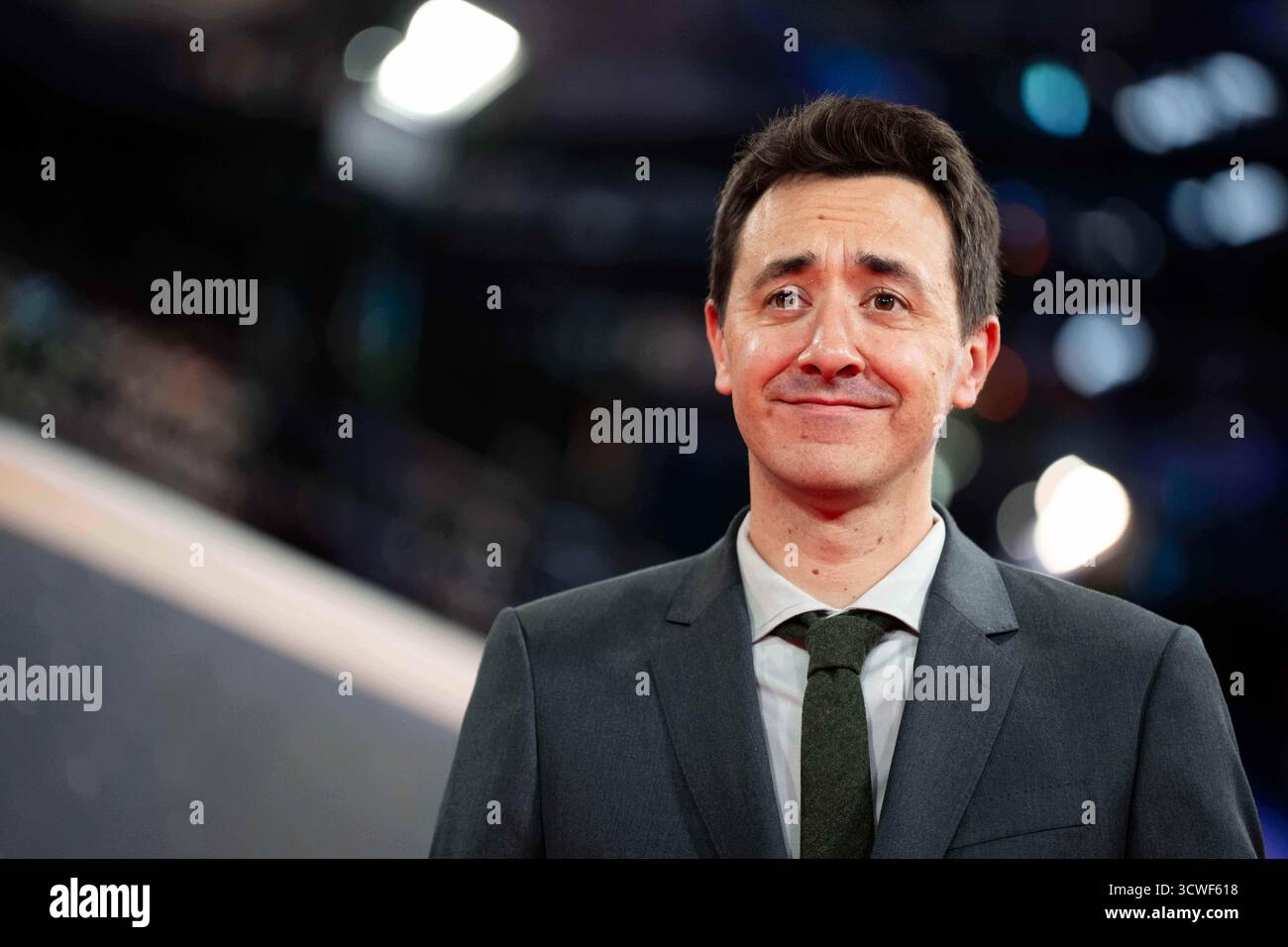 Will Tracy poses for photographers upon arrival at the premiere of the ...