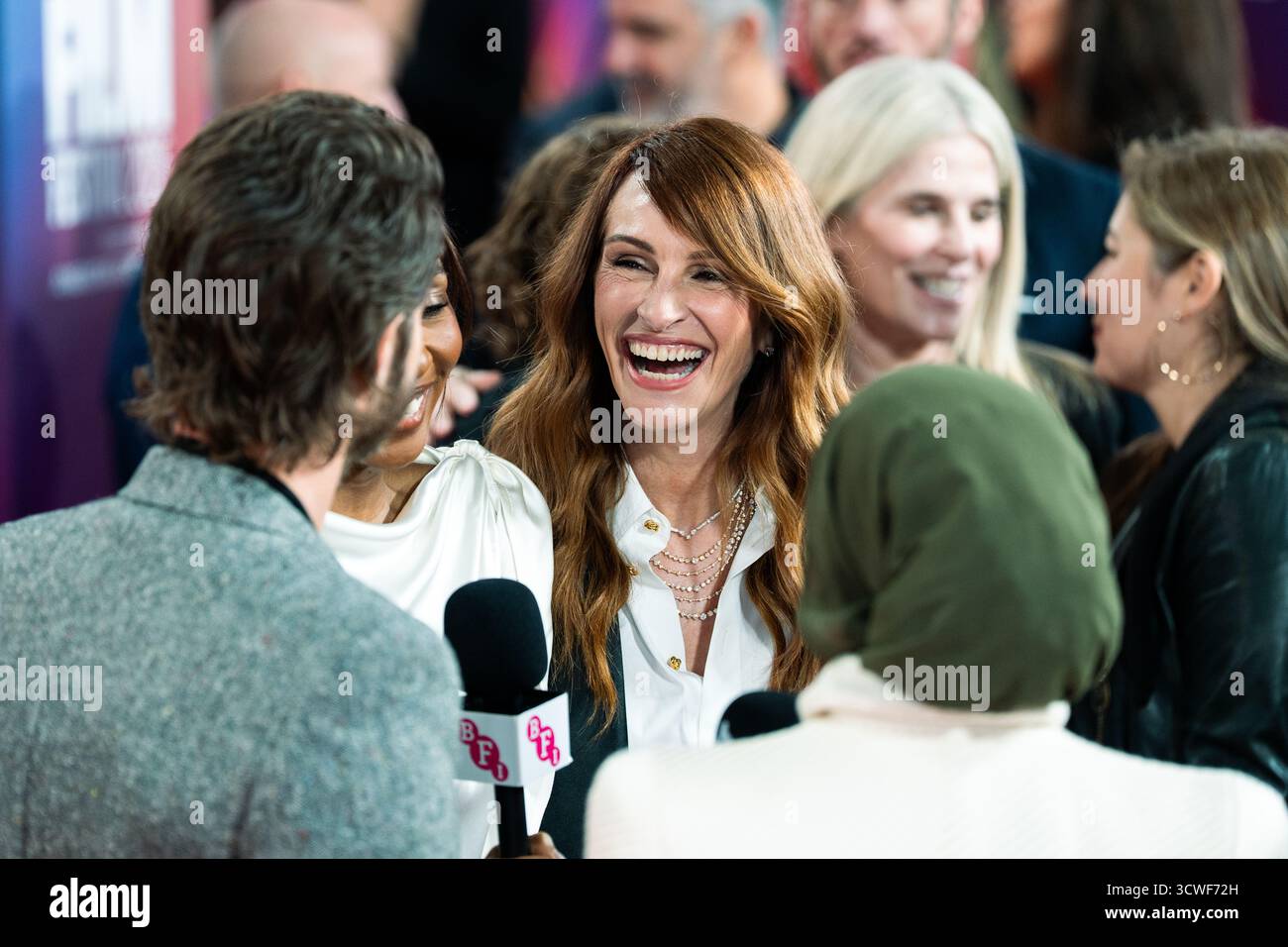 (L-R) Andrew Garfield, Ayo Edebiri, and Julia Roberts attend the "After ...