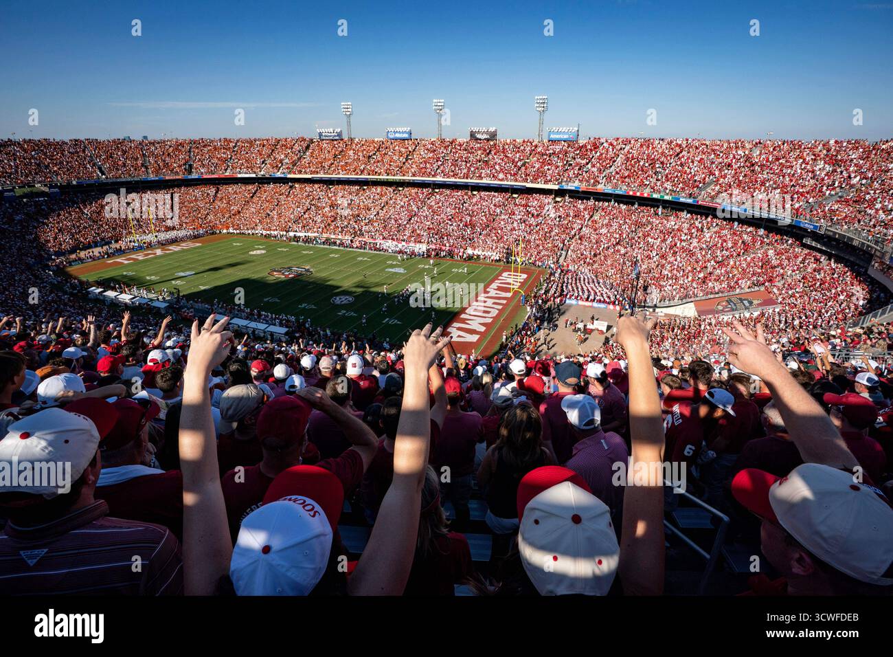 Oklahoma fans cheer during the second half of an NCAA college football ...