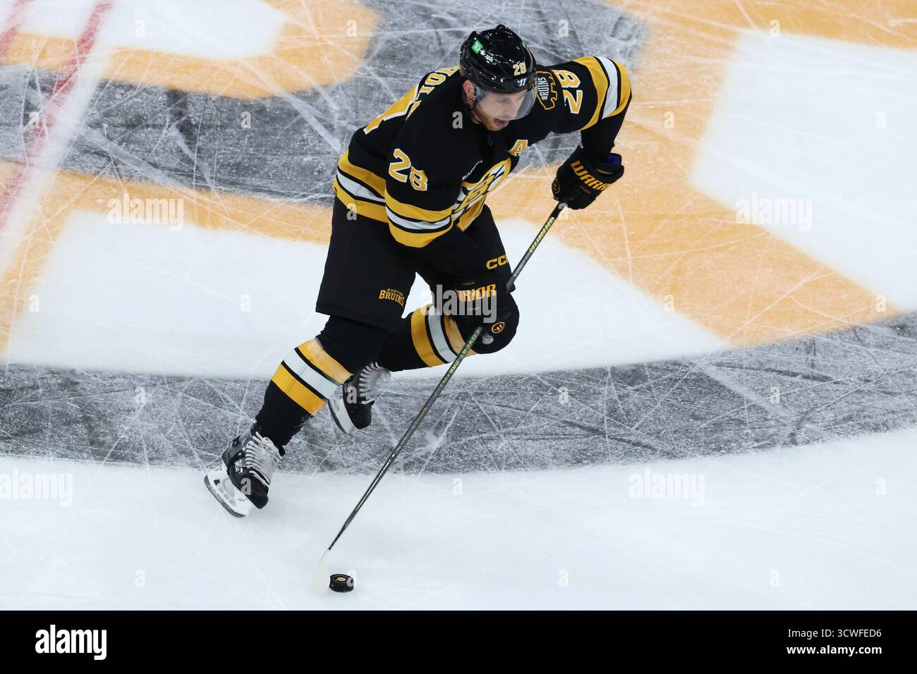 Boston Bruins' Elias Lindholm plays against the Buffalo Sabres during ...