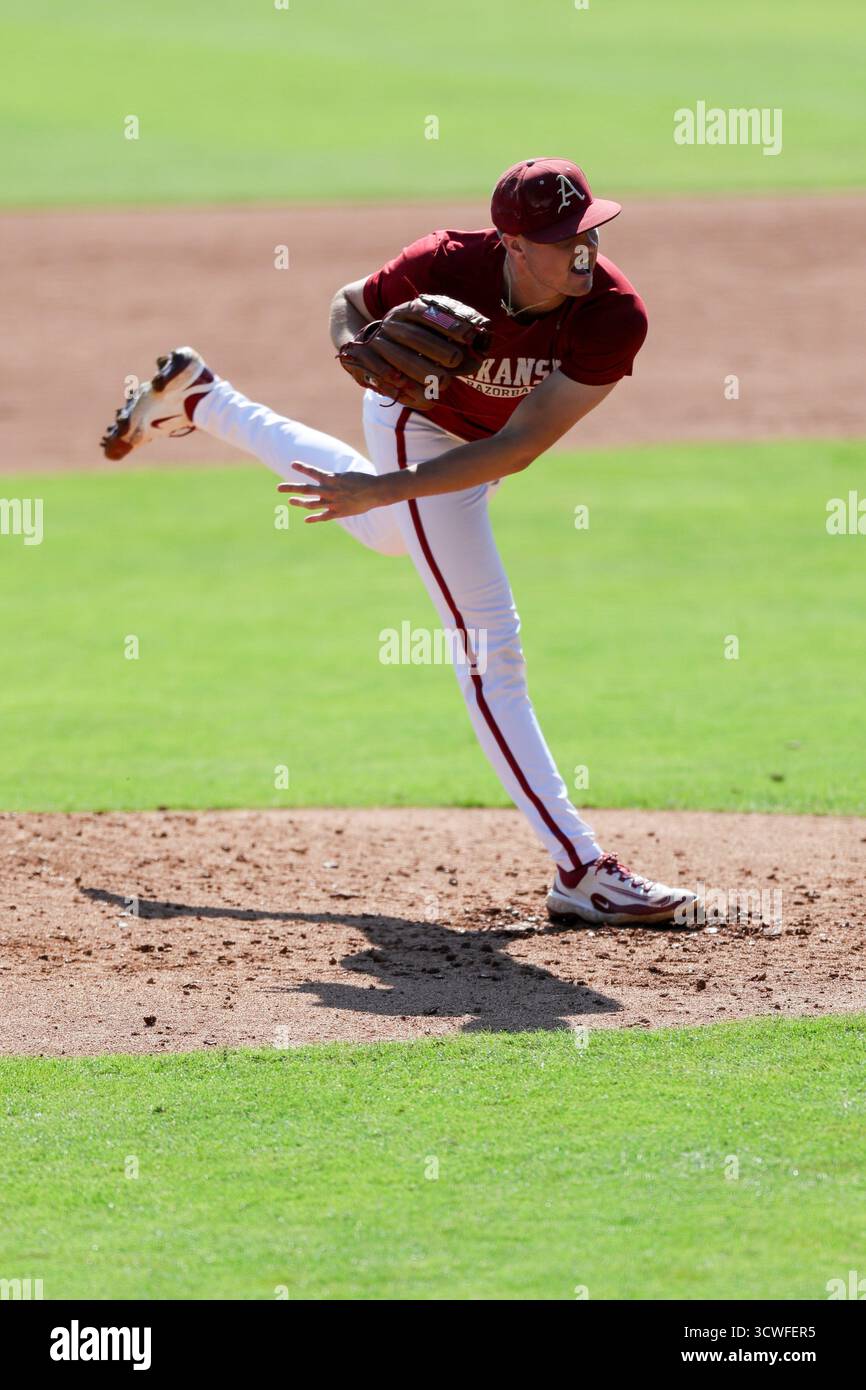 October 11, 2025: Parker Coil (36) pitcher for Arkansas finishes up his ...