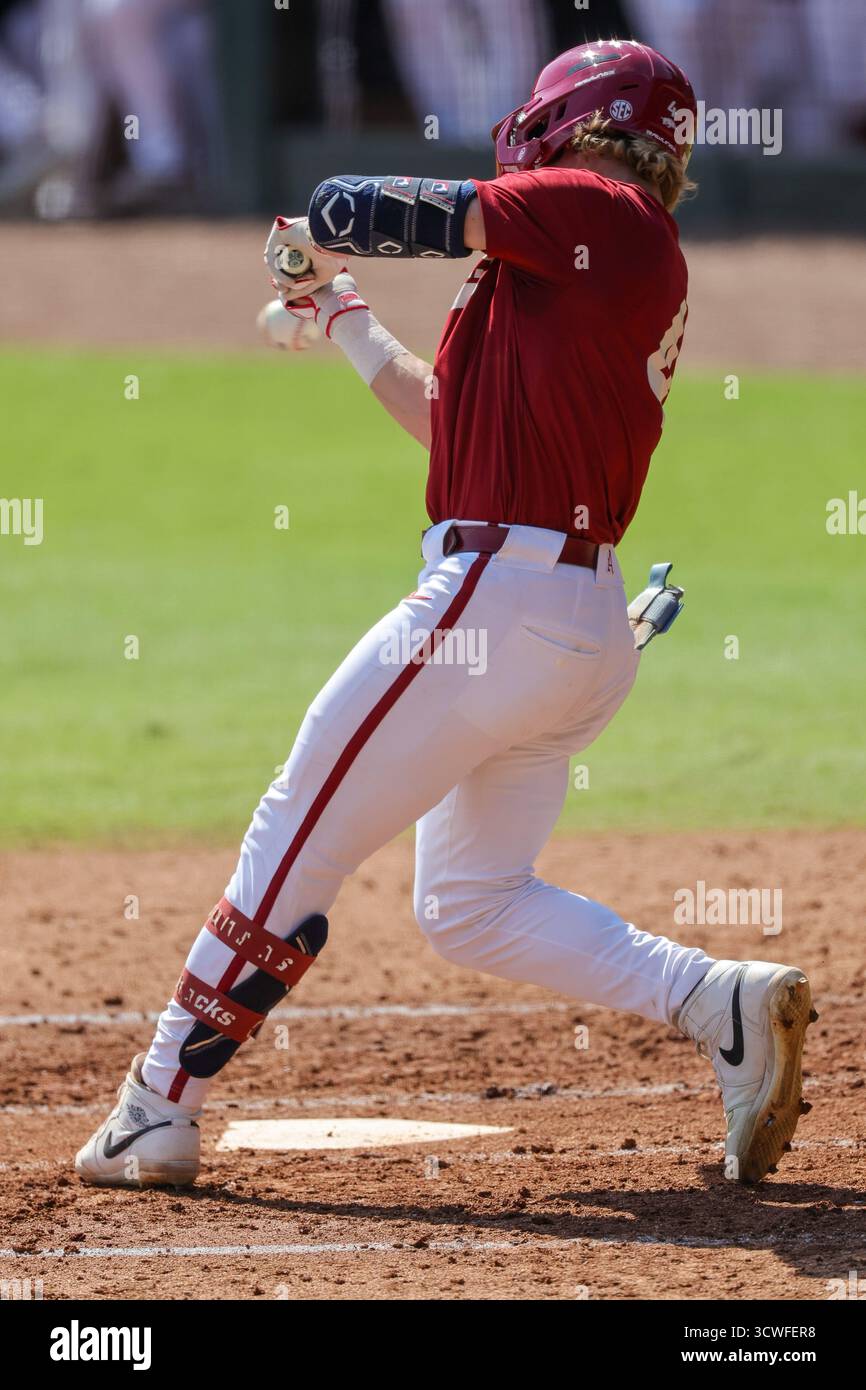 October 11, 2025: Maika Niu (4) of Arkansas looks to put a ball in play ...
