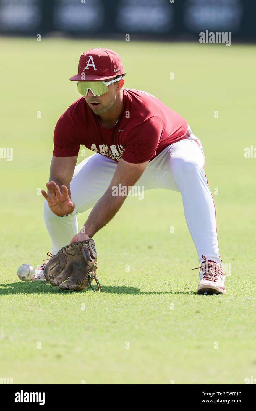 October 11, 2025: Arkansas infielder Tyler Holland (10) comes in on a ...