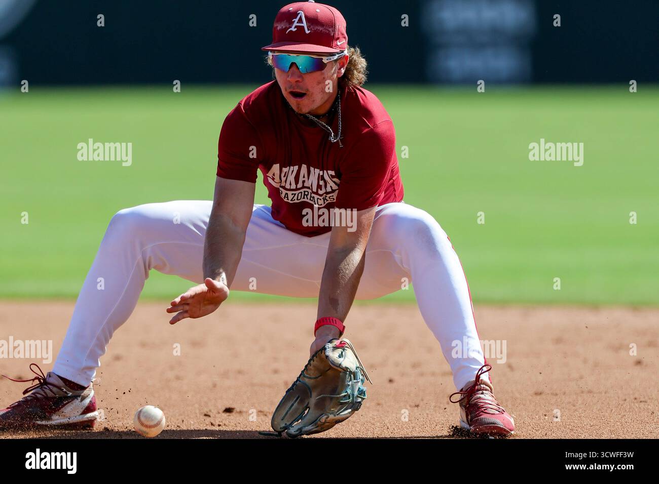 October 11, 2025: Walt Jones (6) Arkansas infielder comes in on a ...
