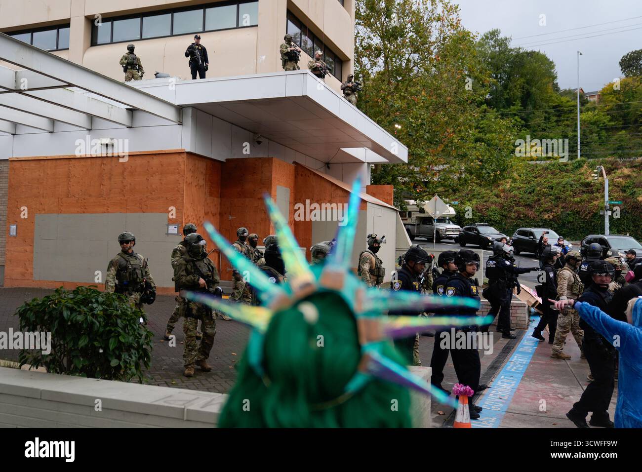 People protest outside a U.S. Immigration and Customs Enforcement ...