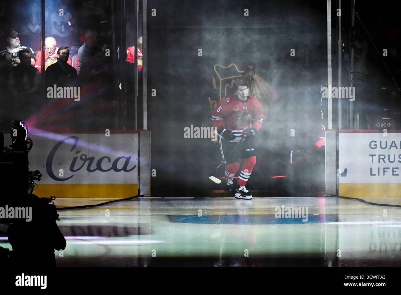 Chicago Blackhawks defenseman Sam Rinzel is introduced to fans before ...
