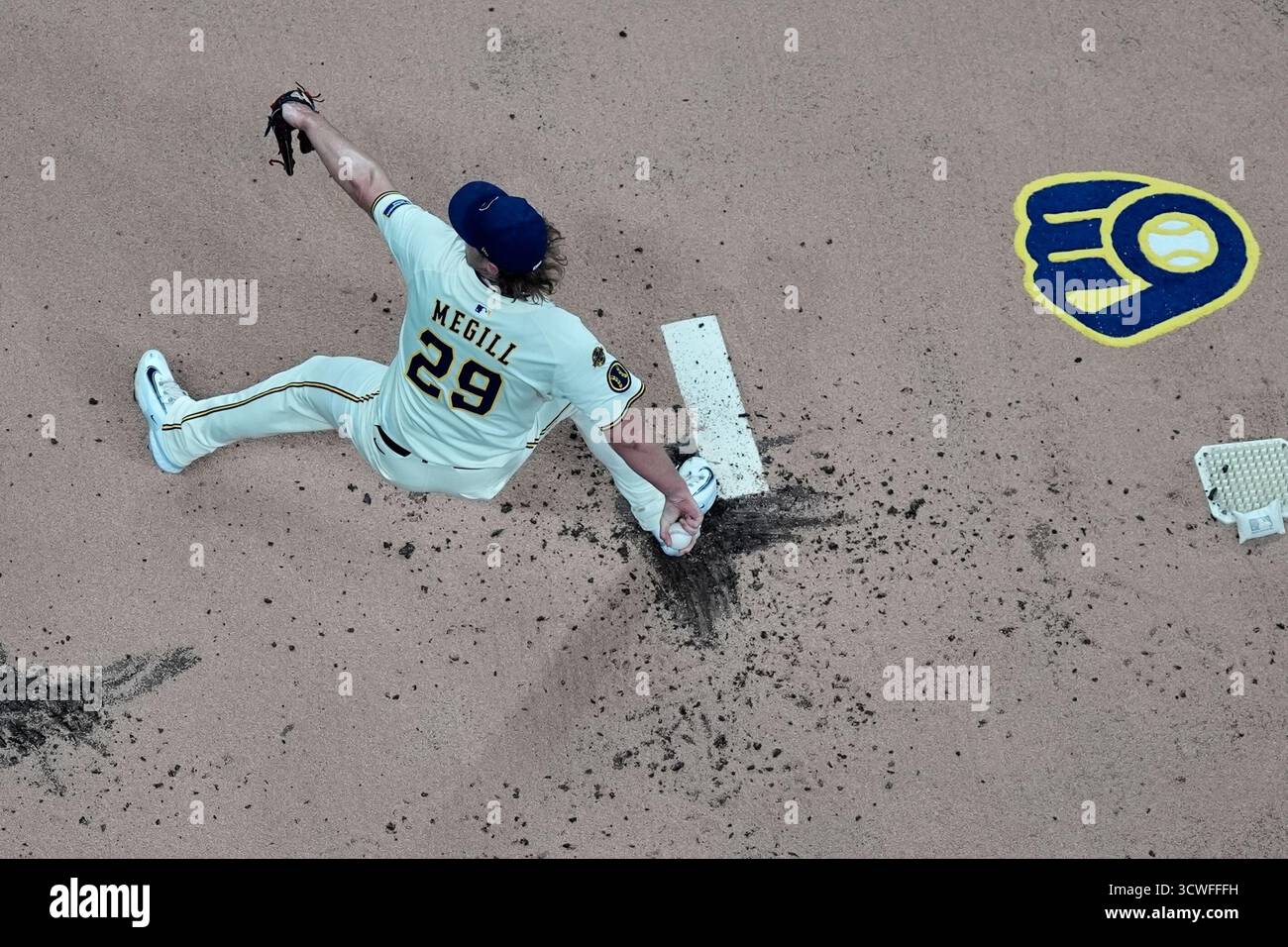 Milwaukee Brewers' Trevor Megill throws during the first inning of Game ...