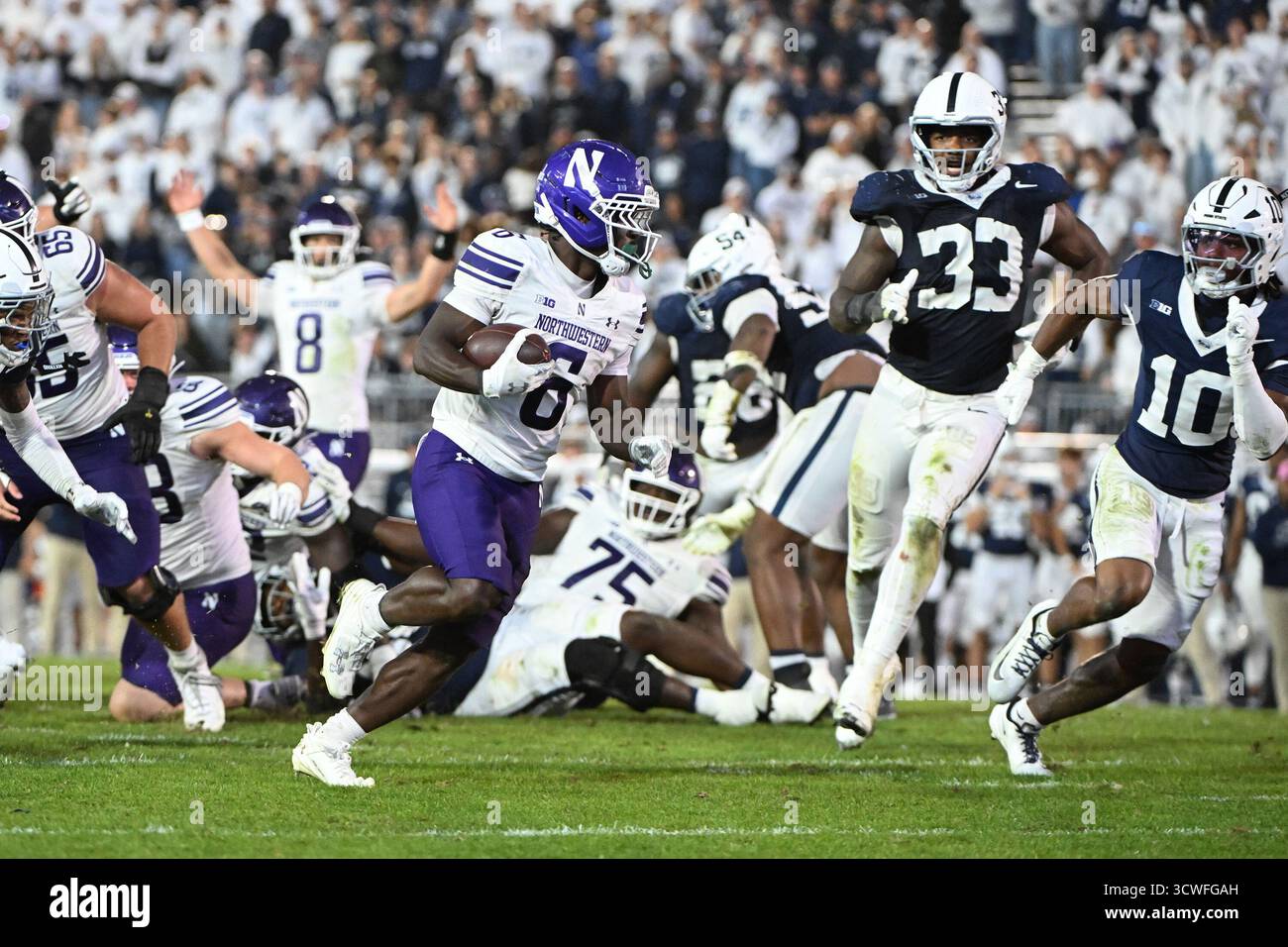 Northwestern running back Joseph Himon II (6) runs for a first down as ...