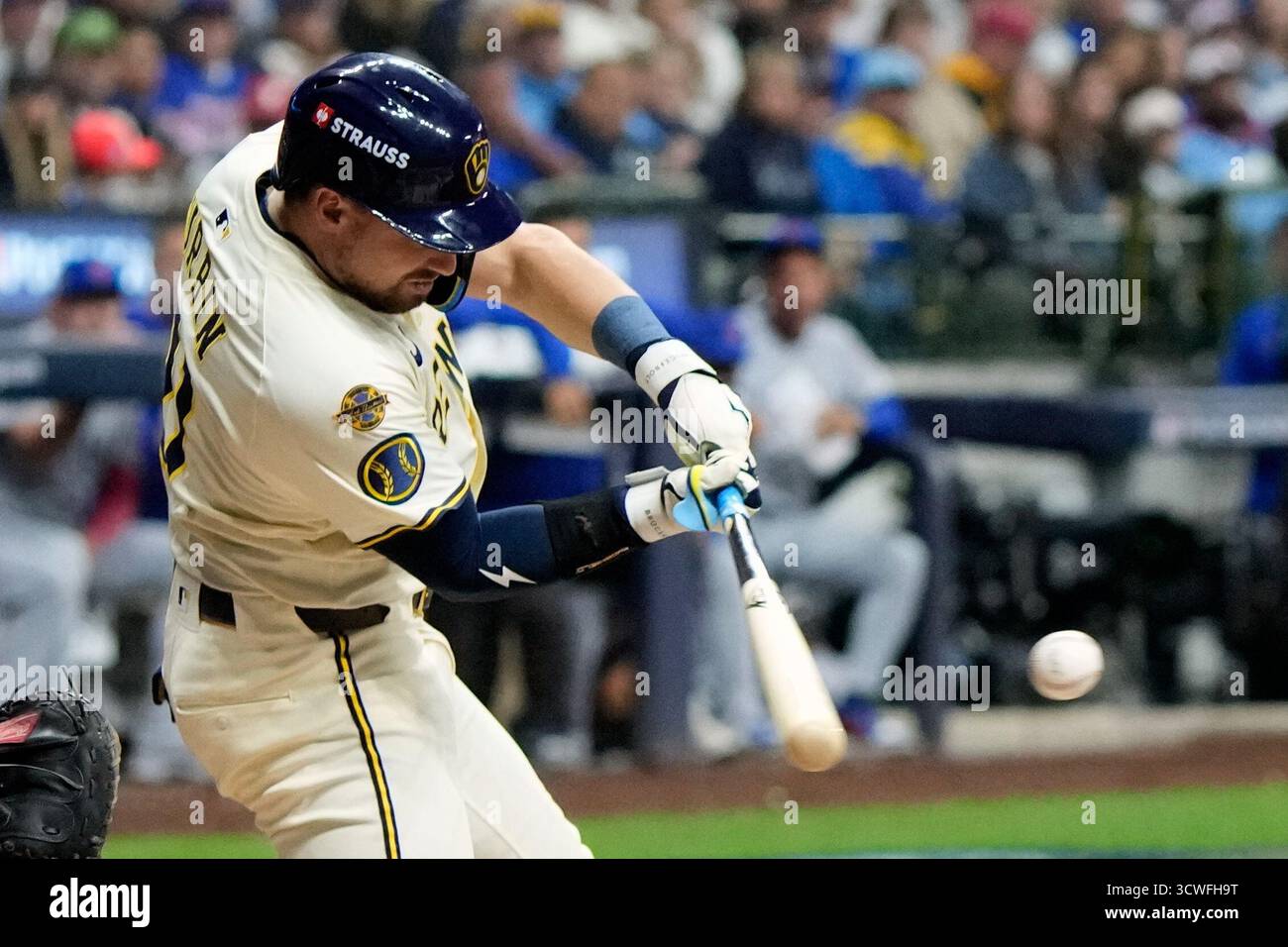Milwaukee Brewers' Caleb Durbin hits a single during the second inning ...