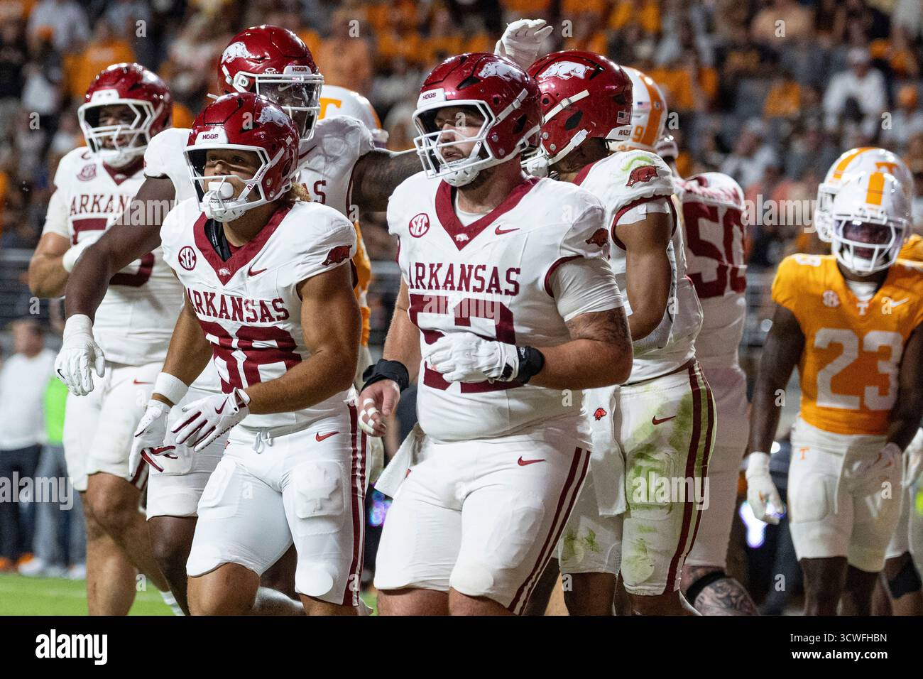 Arkansas tight end Rohan Jones (88) celebrates with offensive lineman ...