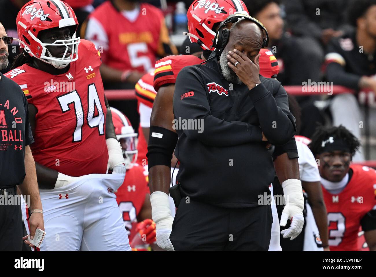 Maryland head coach Michael Locksley, front, reacts during the first ...