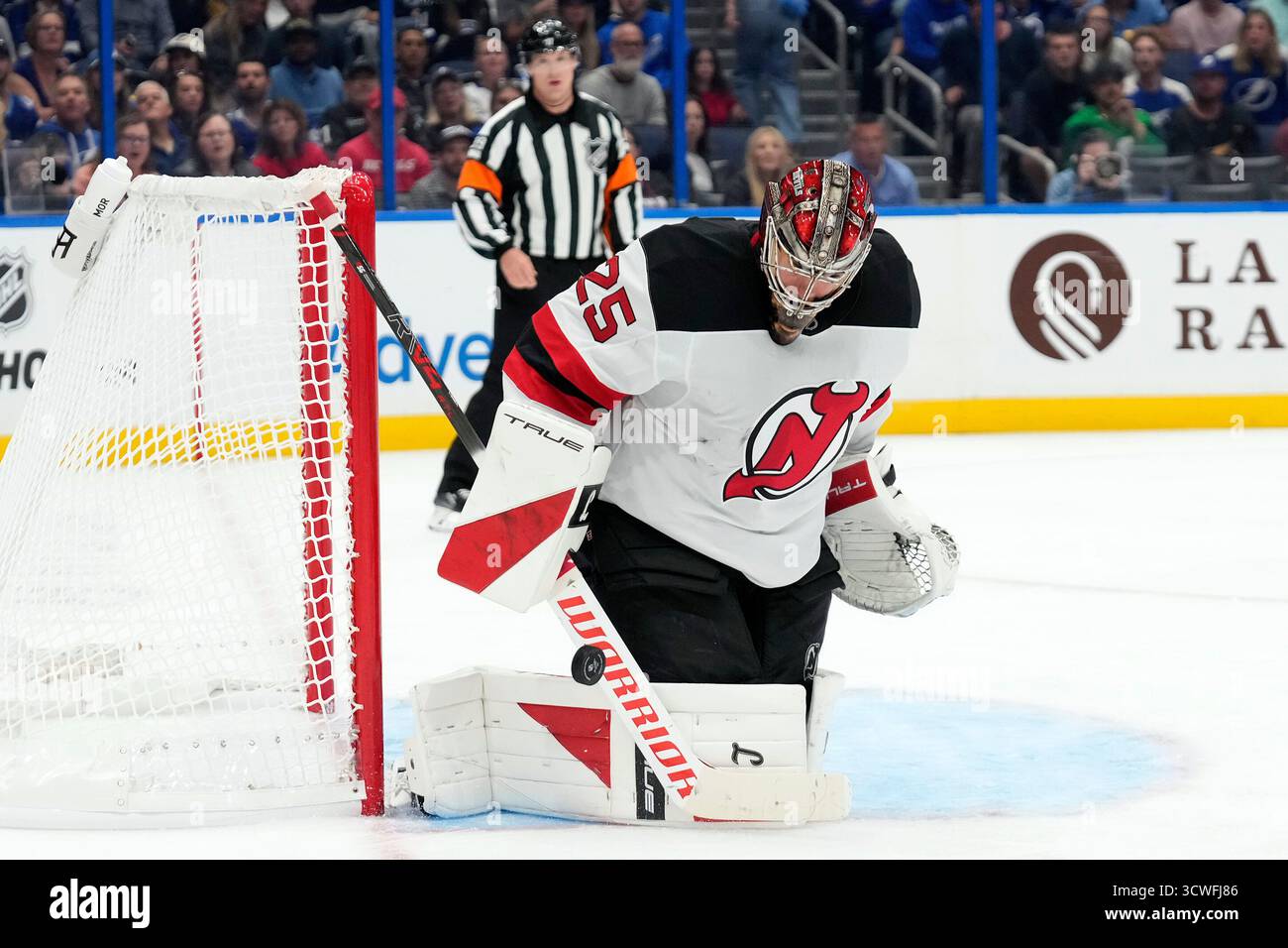 New Jersey Devils goaltender Jacob Markstrom (25) makes a save on a ...