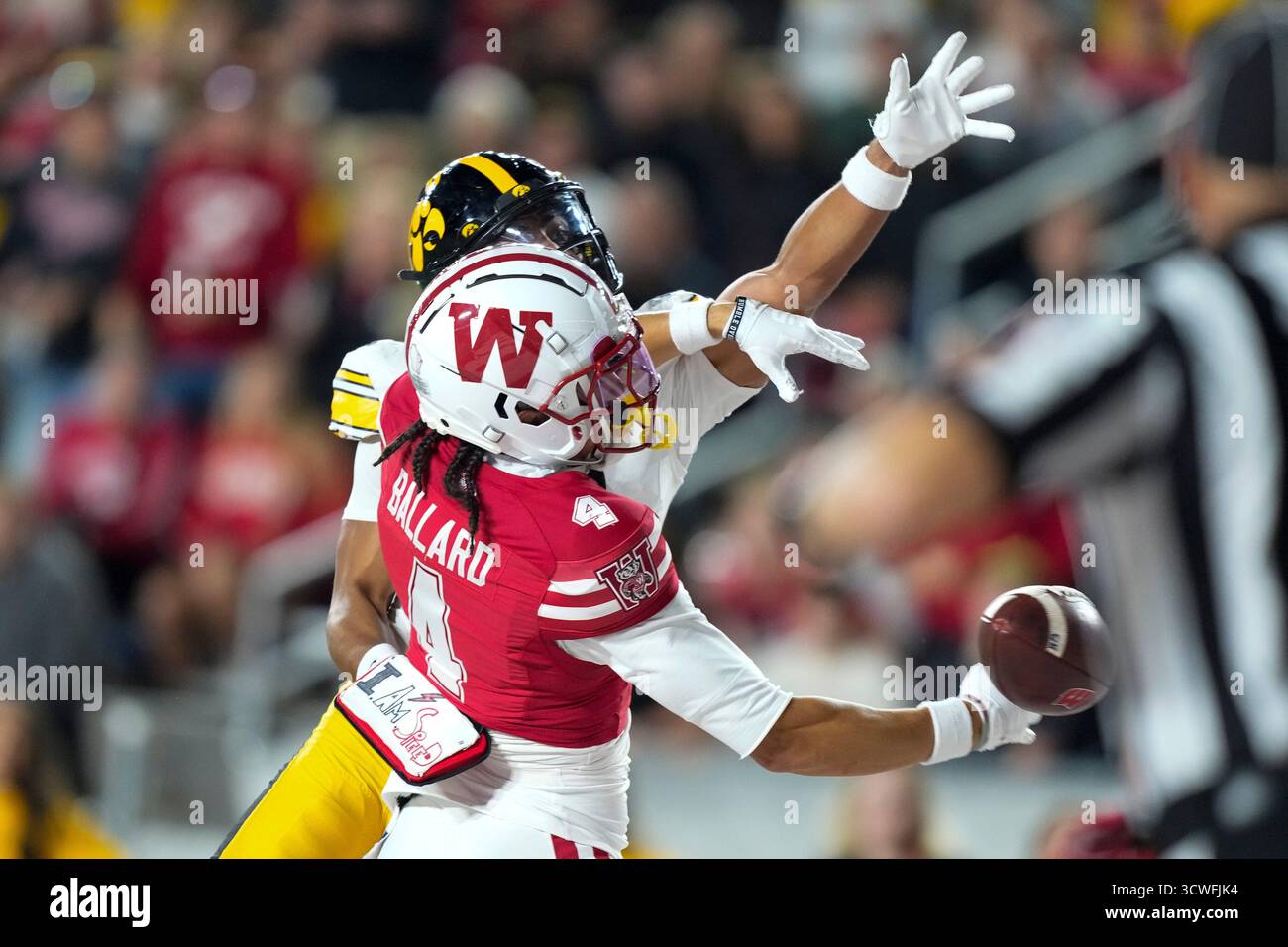 Wisconsin wide receiver Jayden Ballard (4) misses a pass near Iowa ...