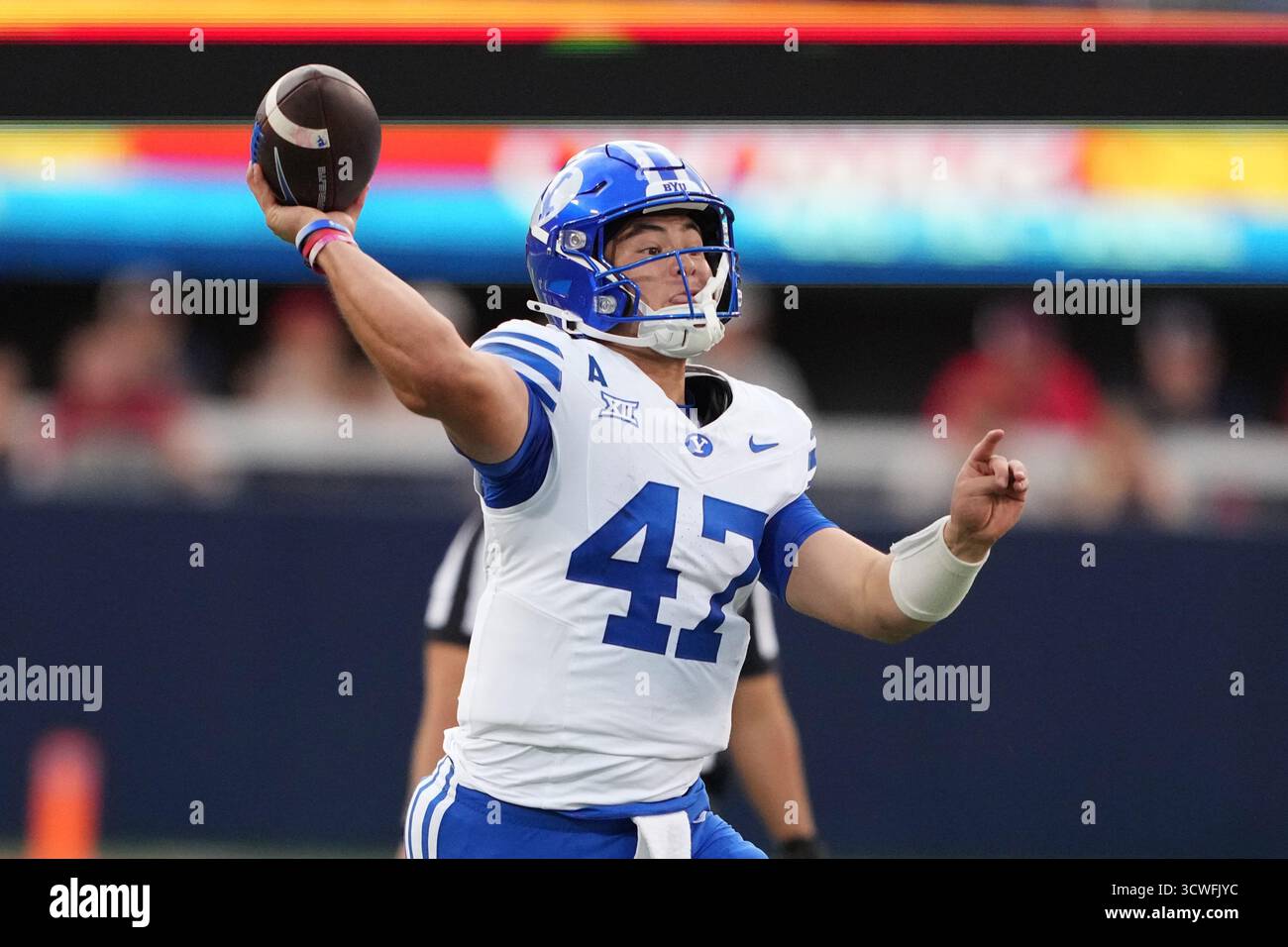 BYU quarterback Bear Bachmeier (47) throws the ball against Arizona in ...