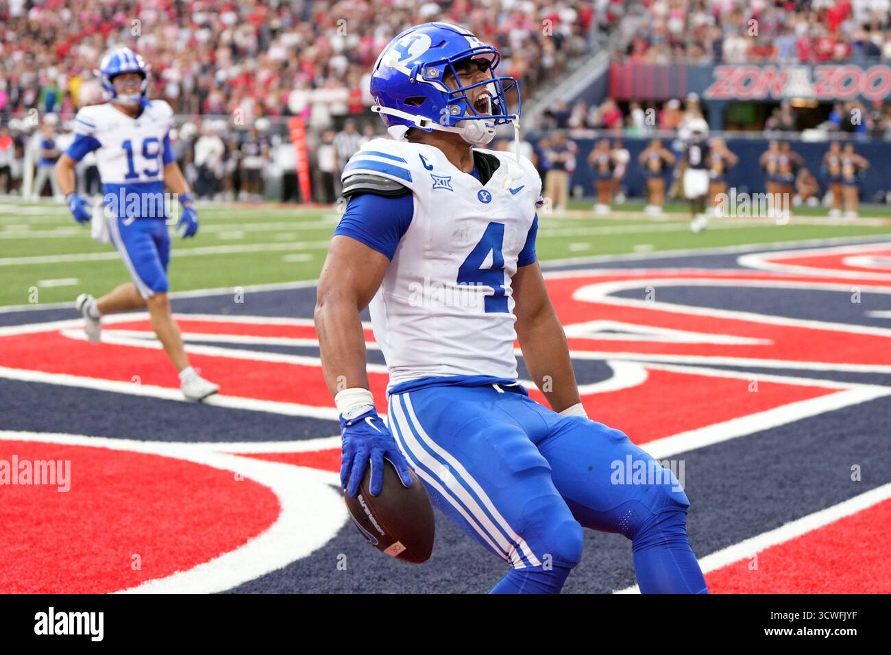 BYU running back LJ Martin (4) reacts after scoring a touchdown against ...