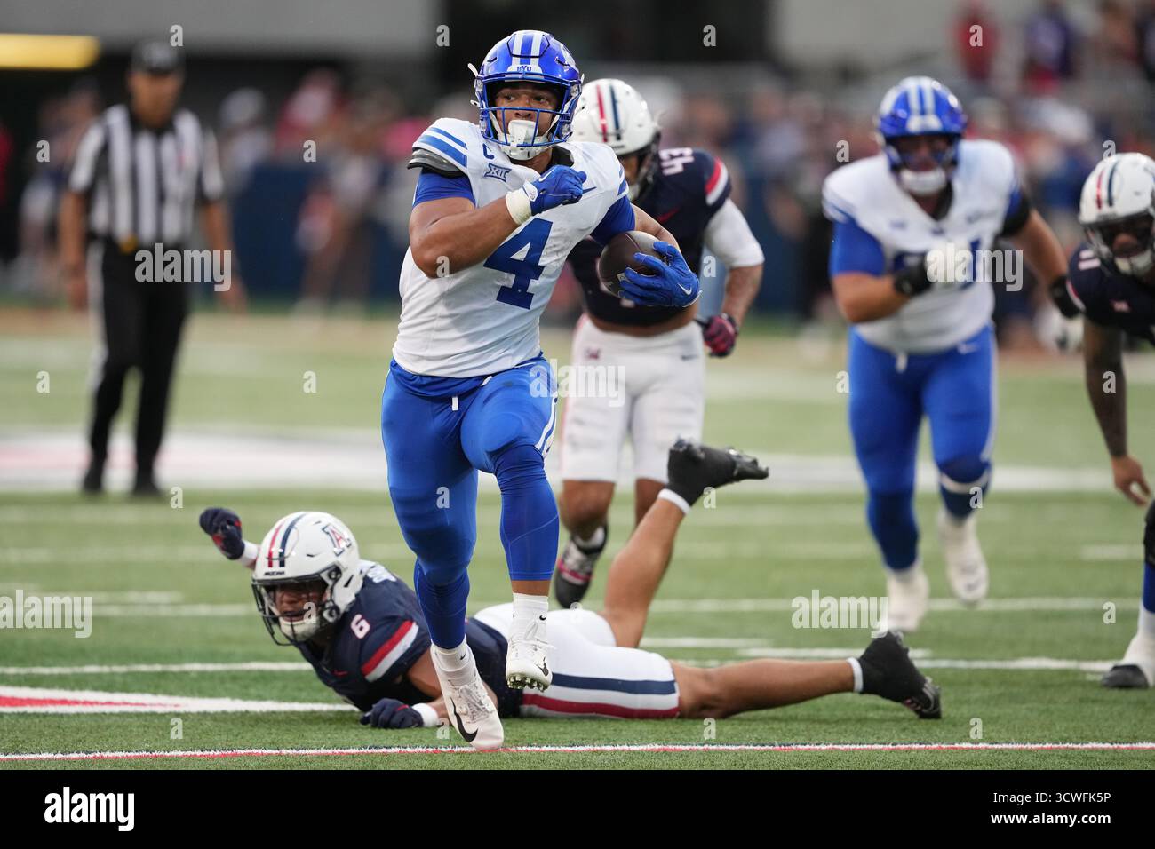 BYU running back LJ Martin (4) runs for a touchdown against Arizona in ...