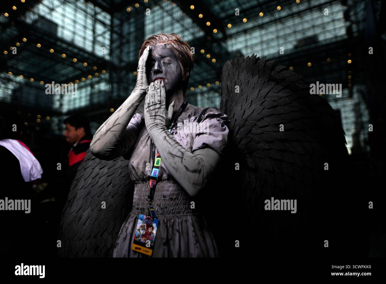 An attendee dressed as a Weeping Angel from Doctor Who poses during New ...