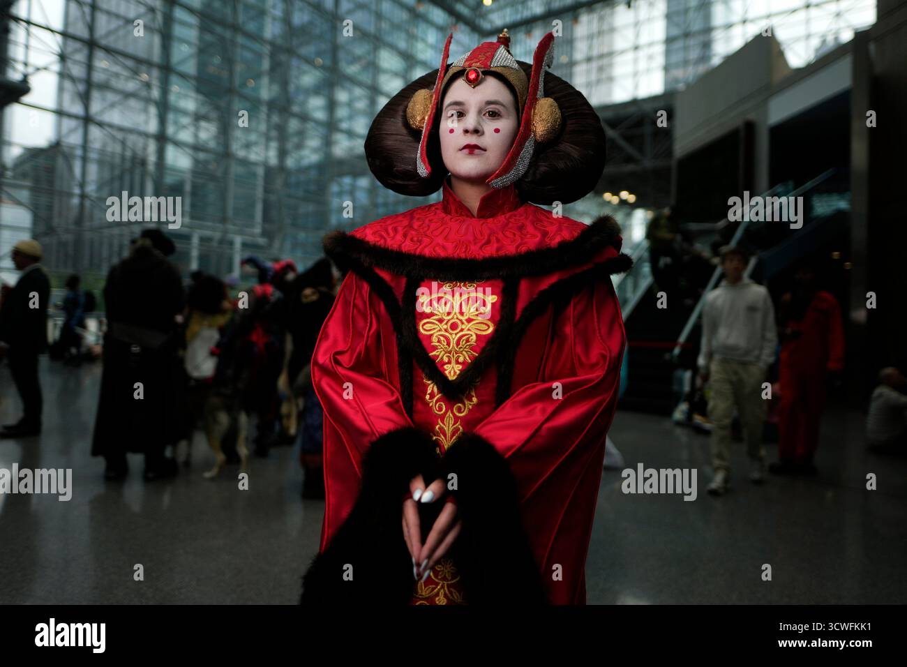 An attendee dressed as Padmé Amidala from Star Wars poses during New ...