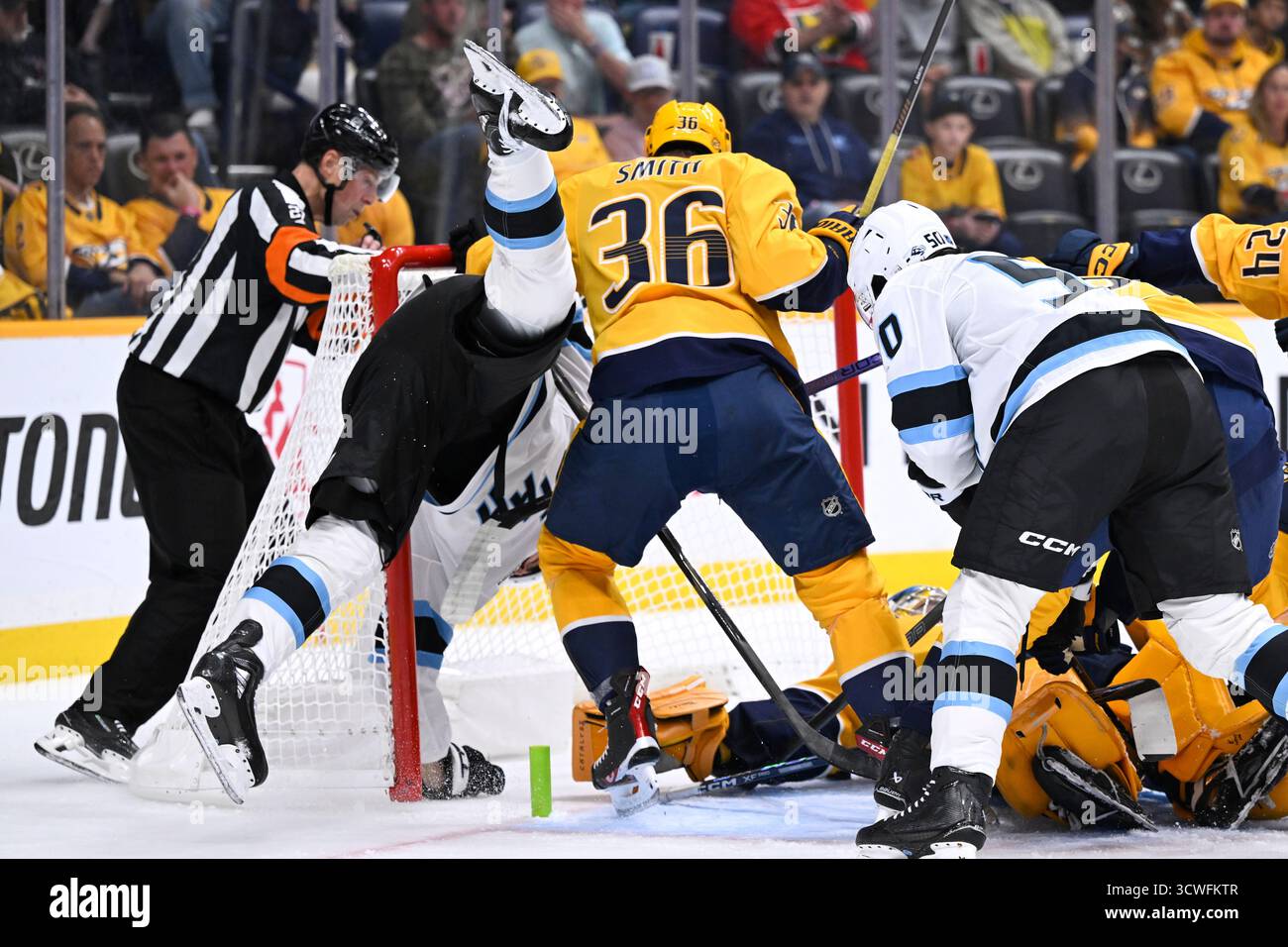 Utah Mammoth center Jack McBain is upended as Nashville Predators left ...