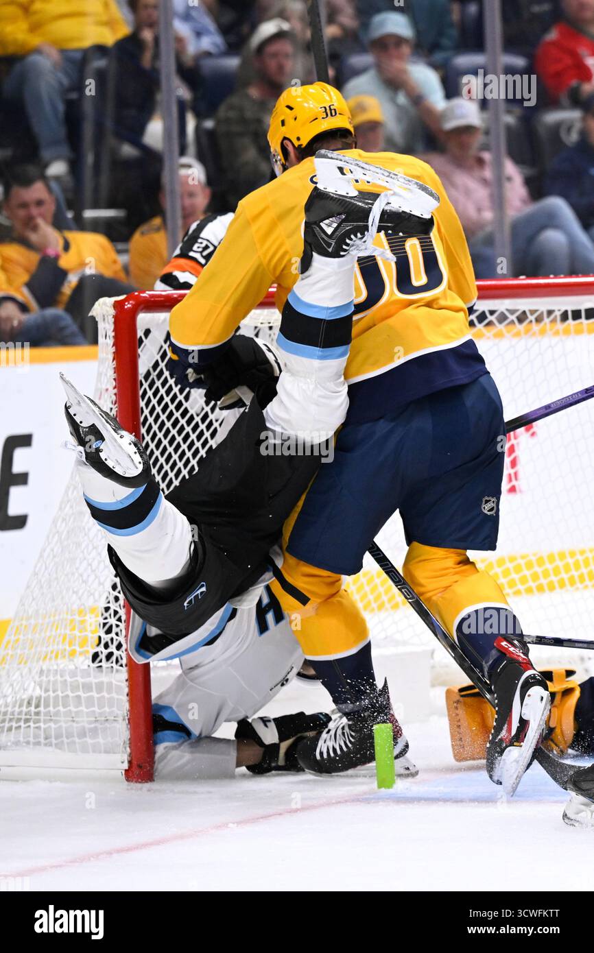 Utah Mammoth center Jack McBain is upended as Nashville Predators left ...