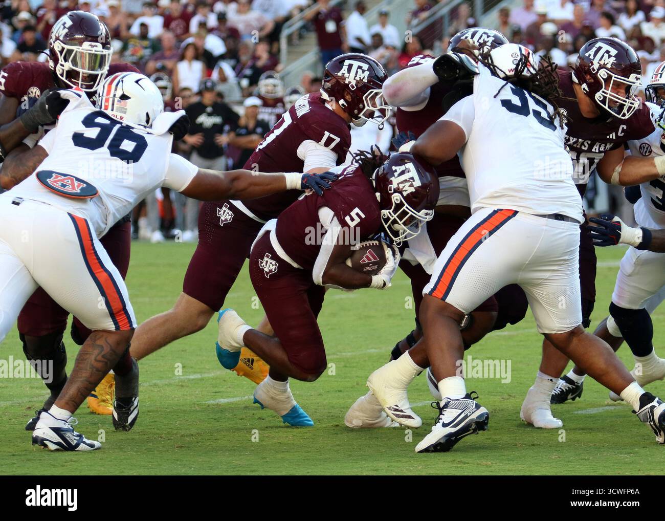 Texas A&M running back Amari Daniels (5) carries the ball during the ...