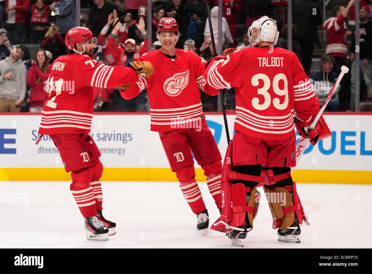 Detroit Red Wings defenseman Simon Edvinsson, center, celebrates with ...