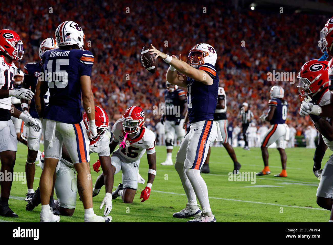 Auburn quarterback Jackson Arnold (11) reacts after running for first ...
