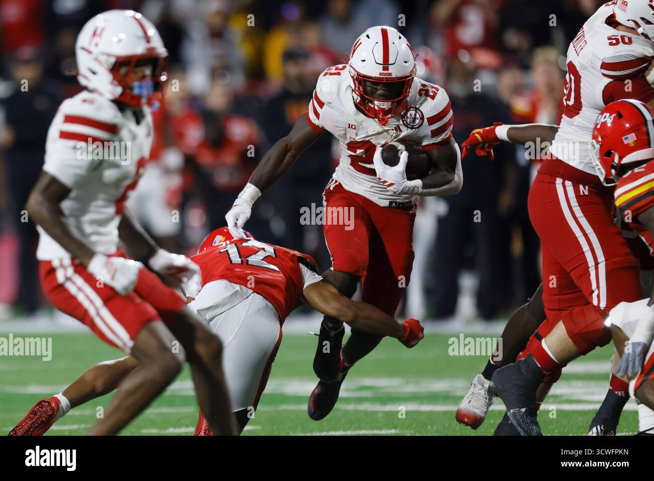 Nebraska running back Emmett Johnson (21) gains yardage during the ...
