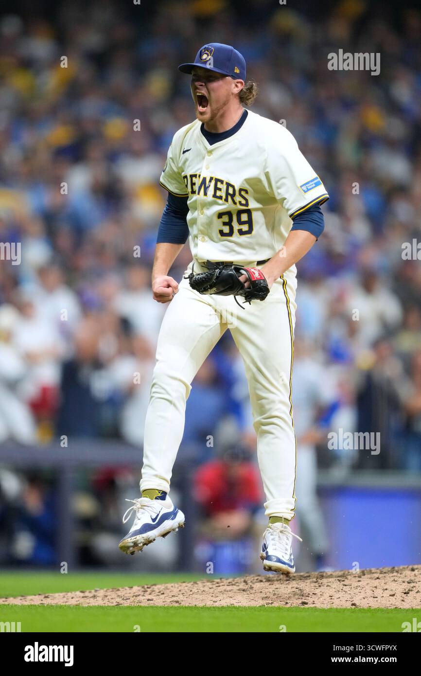 Milwaukee Brewers pitcher Chad Patrick (39) reacts after striking out ...