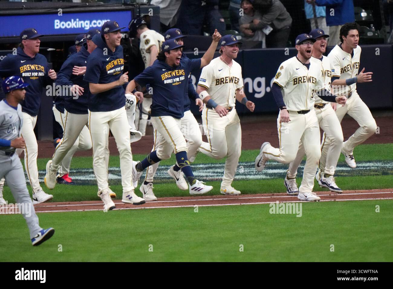 The Milwaukee Brewers celebrate after winning Game 5 of baseball's ...