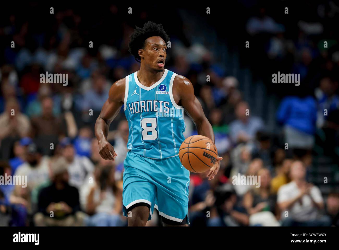 Charlotte Hornets guard Collin Sexton (8) advances the ball down court ...