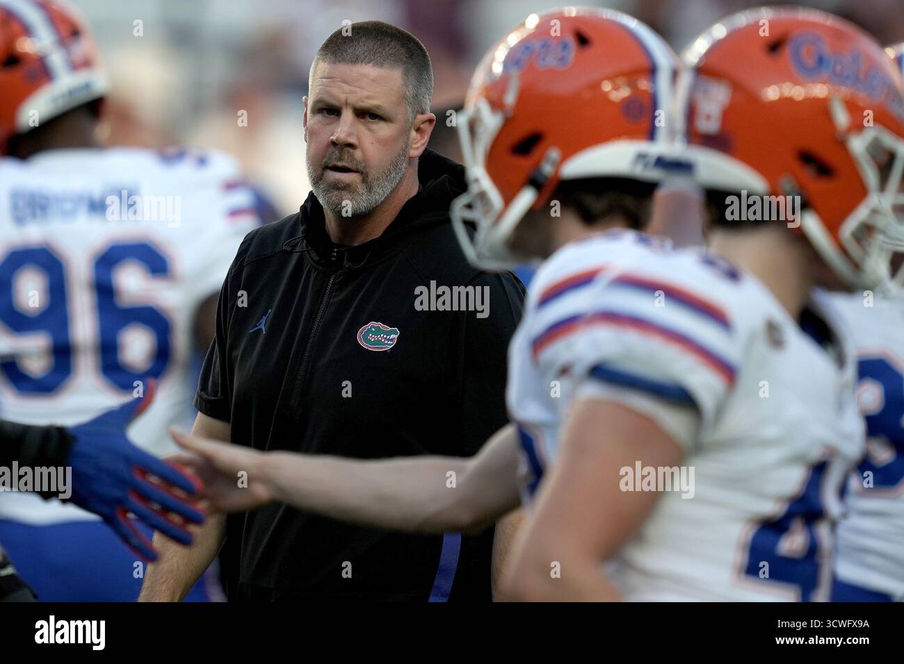 Florida head coach Billy Napier watchs his team run drills before the ...