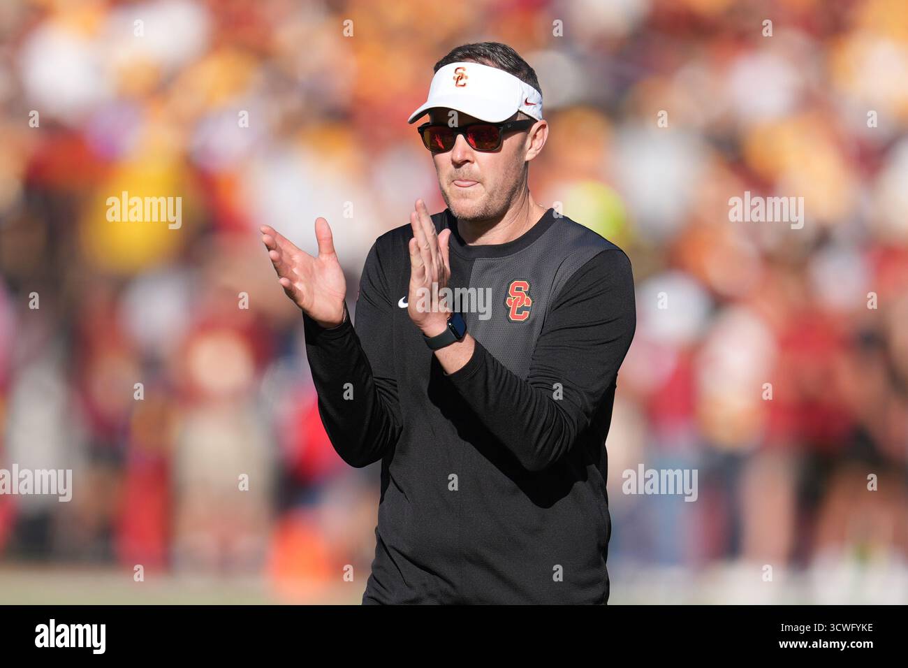 Southern California head coach Lincoln Riley walks on the field before ...