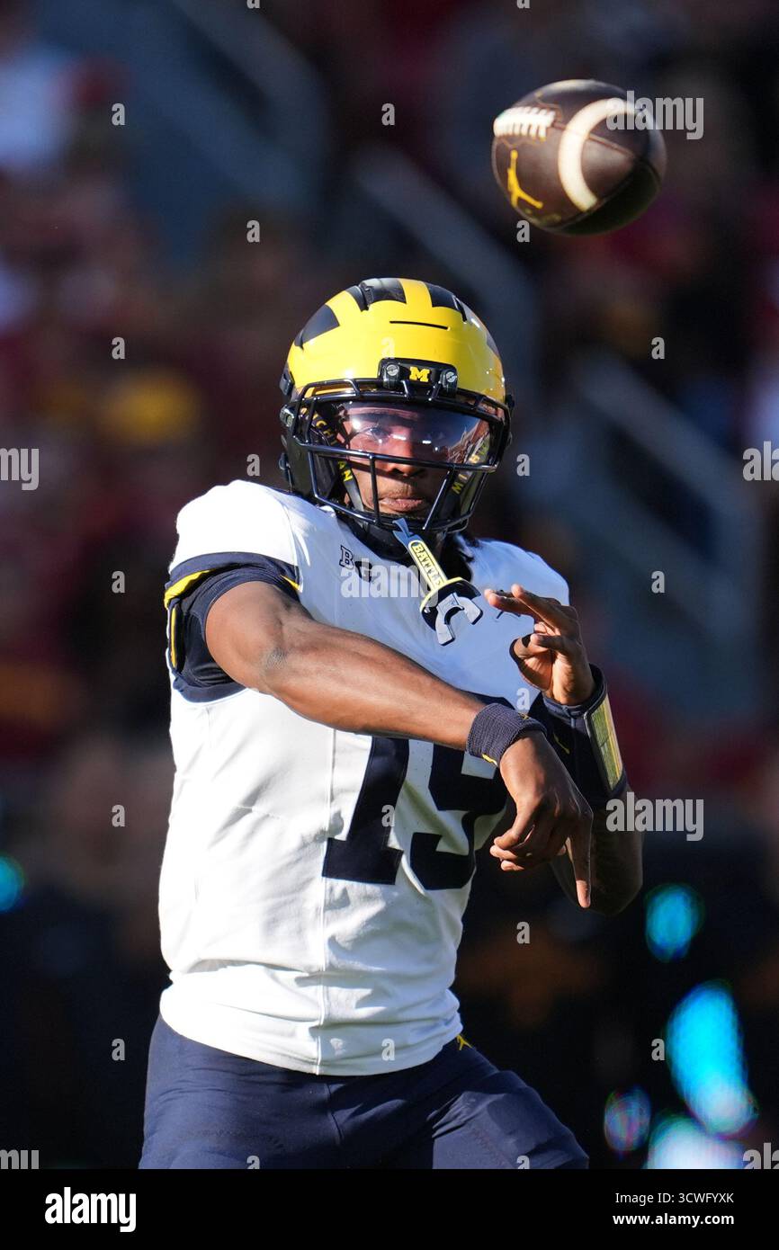 Michigan quarterback Bryce Underwood (19) throws during an NCAA college football game against ...
