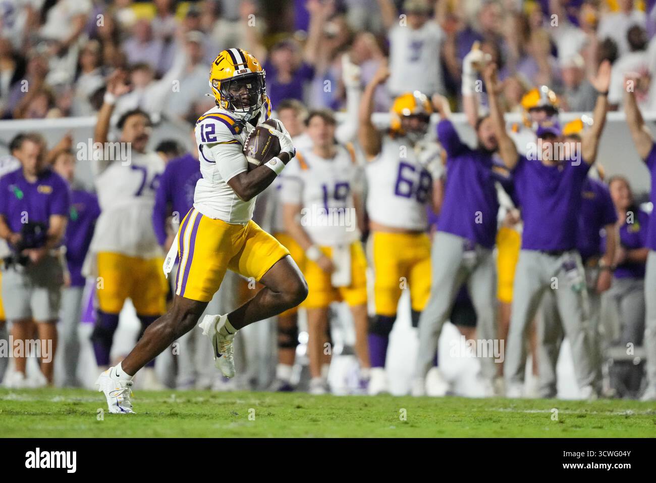LSU wide receiver Kyle Parker (12) carries for a touchdown against ...
