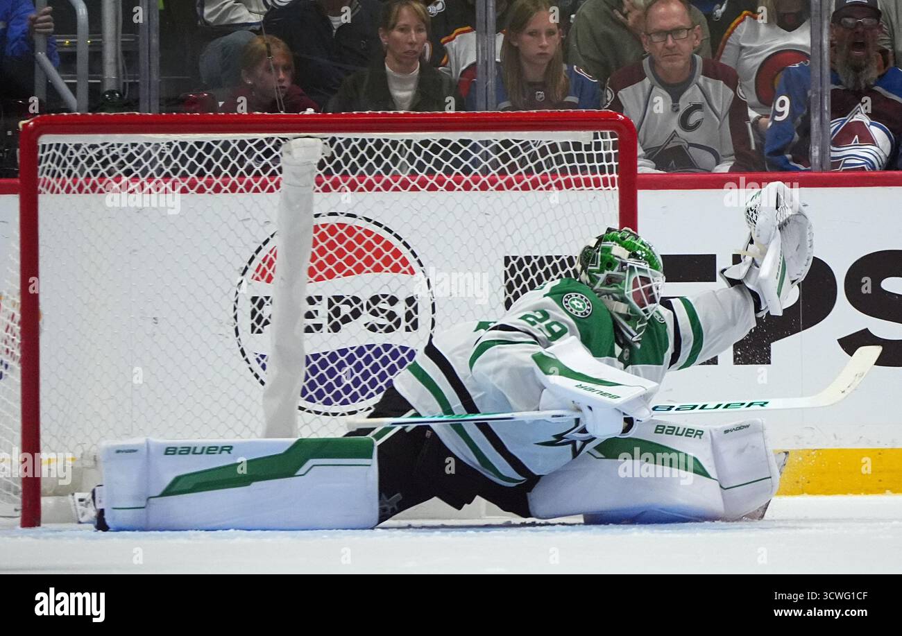 Dallas Stars goaltender Jake Oettinger makes a glove save in overtime ...