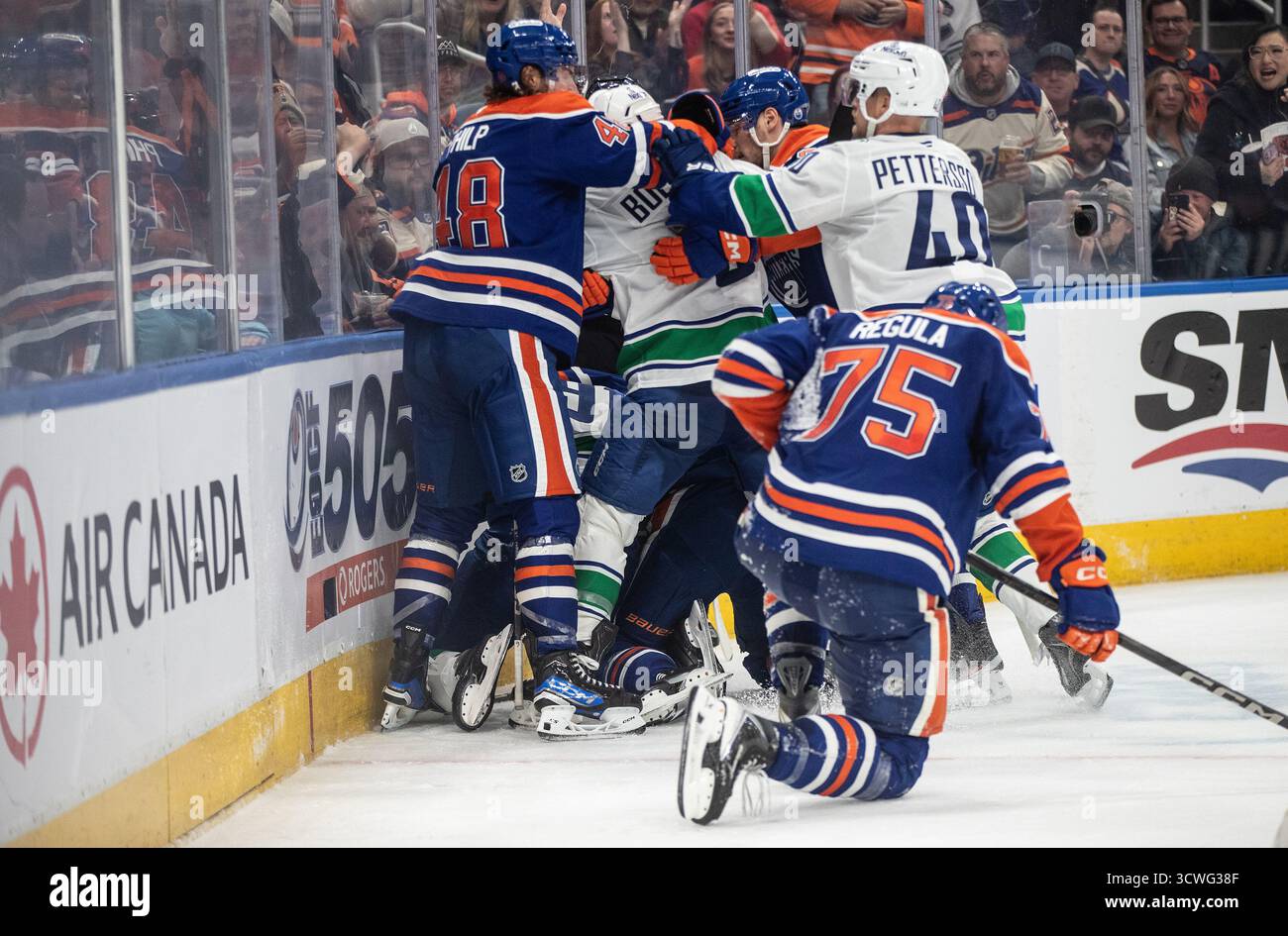 Vancouver Canucks and Edmonton Oilers players rough it up after Canucks ...