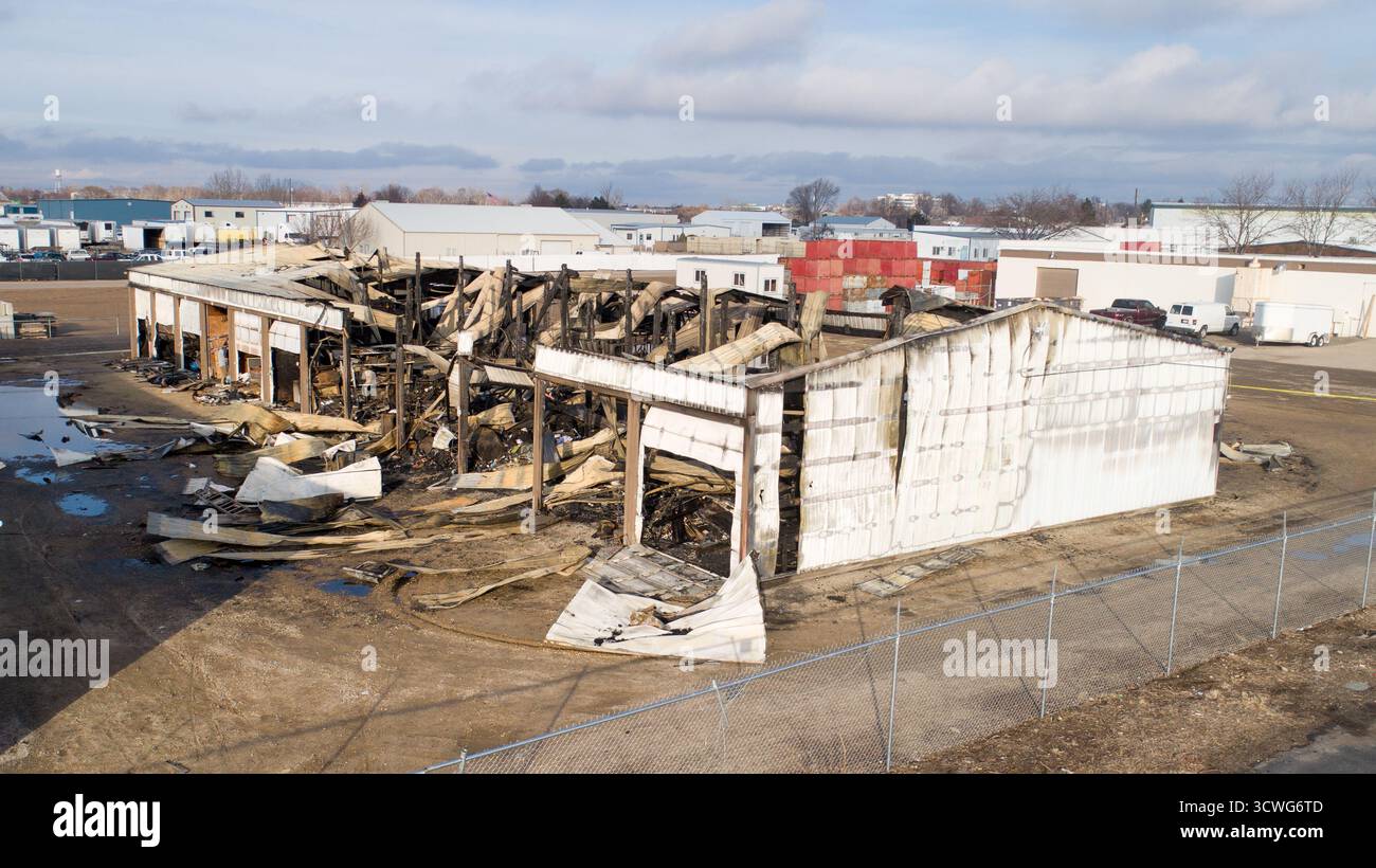 A storage facility destroyed by a large fire Stock Photo - Alamy