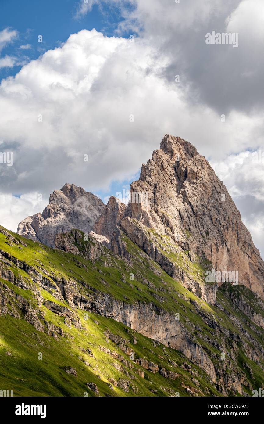 Dramatic mountain peak of Gran Fermeda and Sass Rigais rising sharply ...