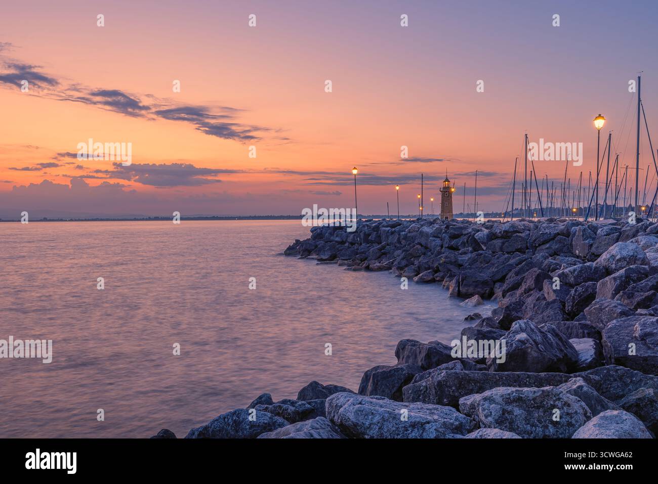 A sunrise photo at the lighthouse in Desenzano del Garda, Italy ...