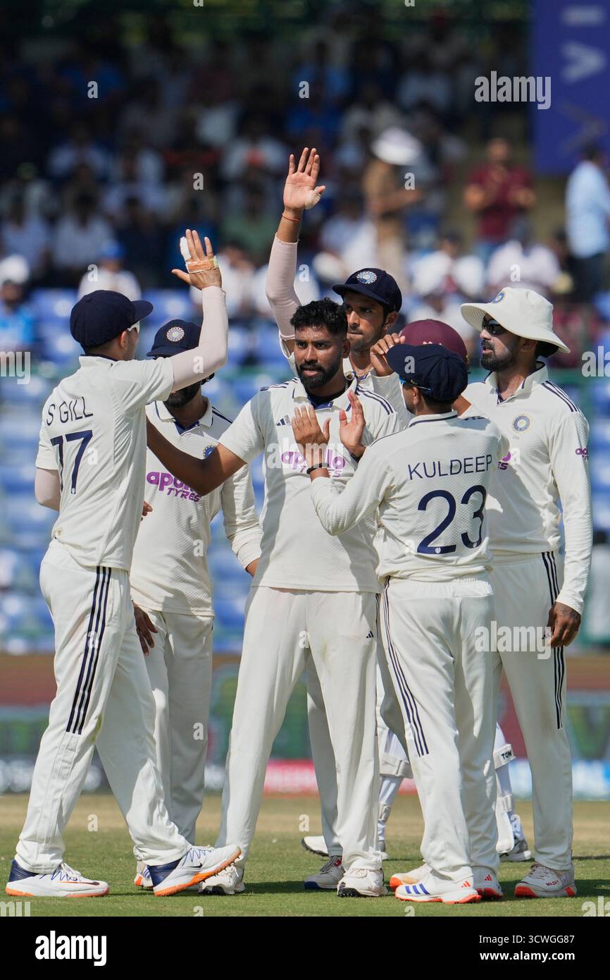 India's Mohammed Siraj, center, celebrates the dismissal of West Indies ...