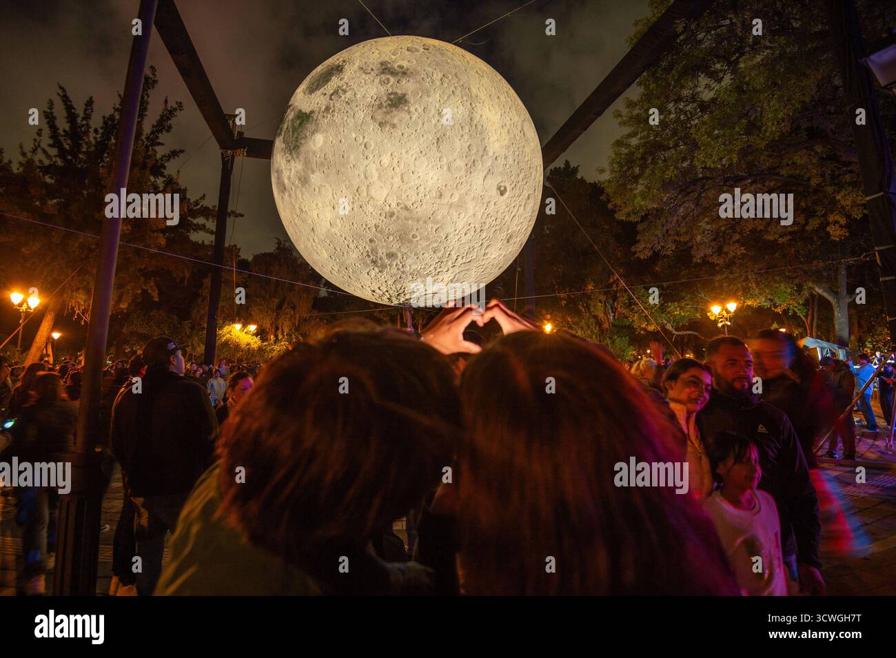 A 5km replica of the moon by British artist Luke Jerram can be seen in ...