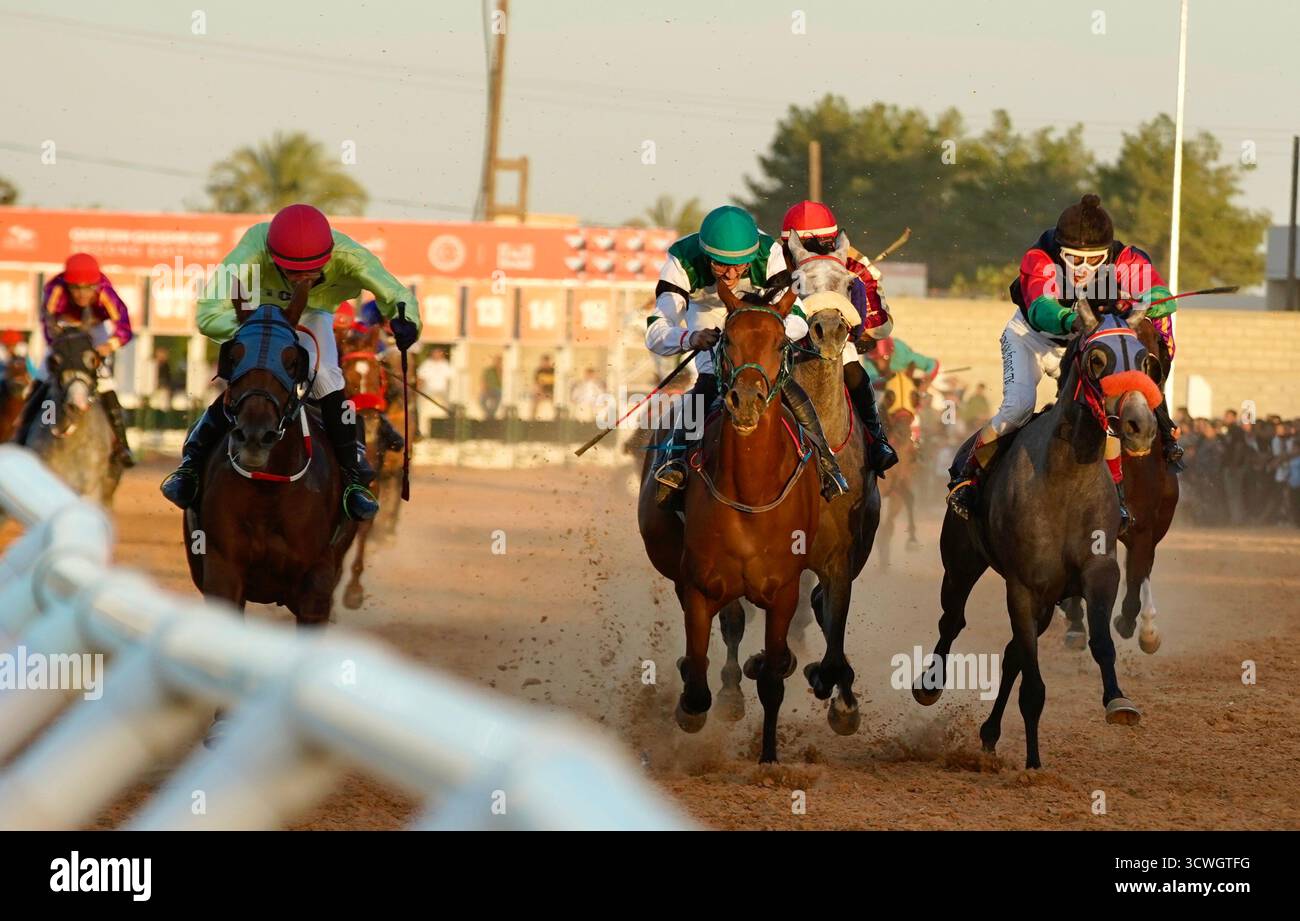 Tripoli, Libya. 10th Oct, 2025. Riders compete in a horse race in ...