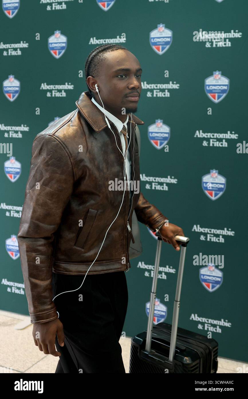 New York Jets Tony Adams arrives before an NFL football game between ...