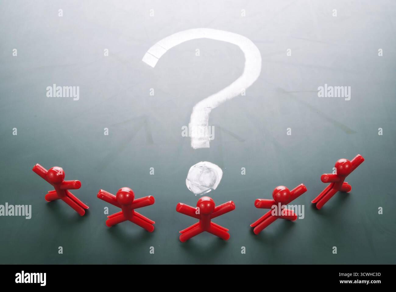 Business team face a big question mark Stock Photo - Alamy